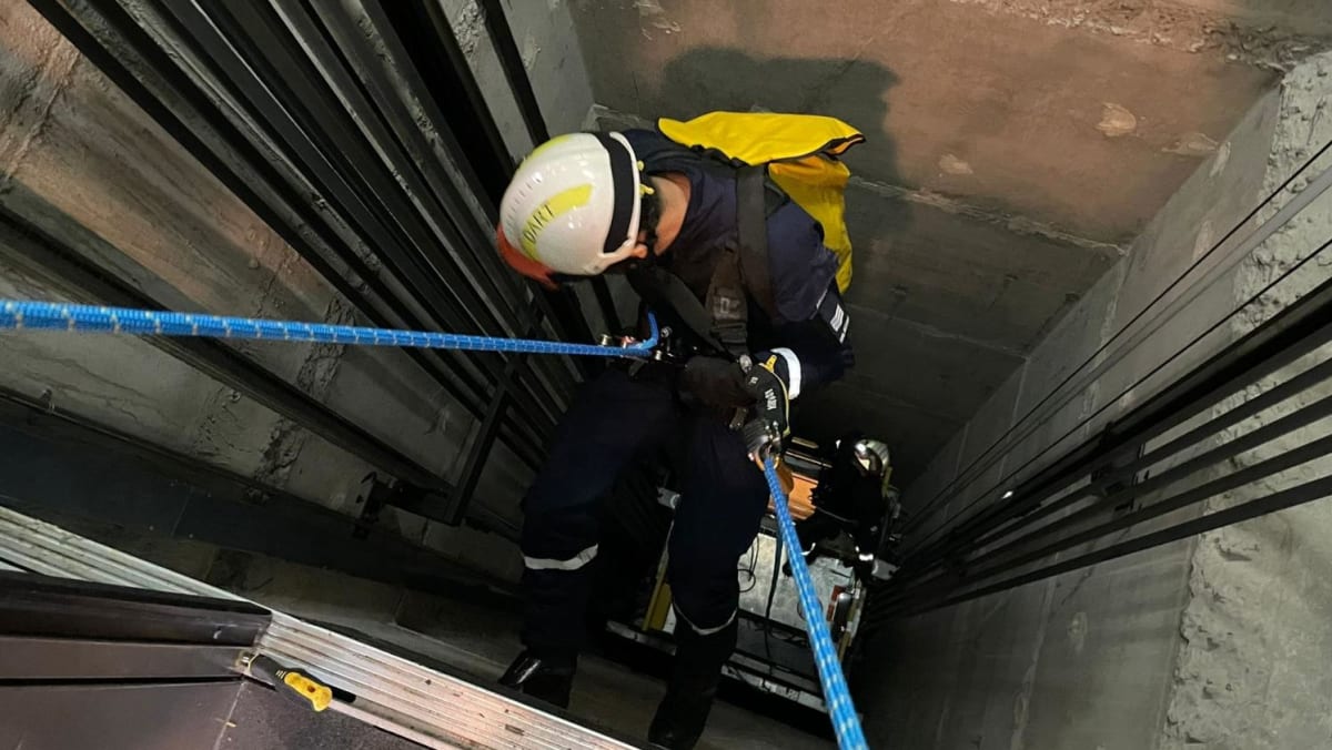 Three people rescued after getting trapped in lift - CNA