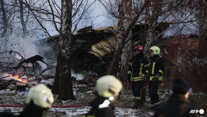 DHL cargo plane crashes as it nears Lithuania airport, killing one - CNA