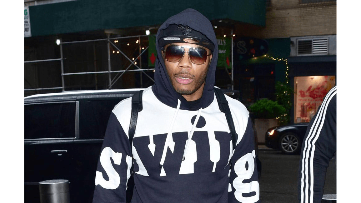 Nelly hits out at father in social media rant - 8days