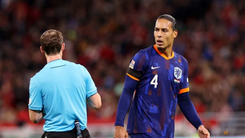 Suspended Van Dijk heads back to Liverpool for rest after red card - CNA