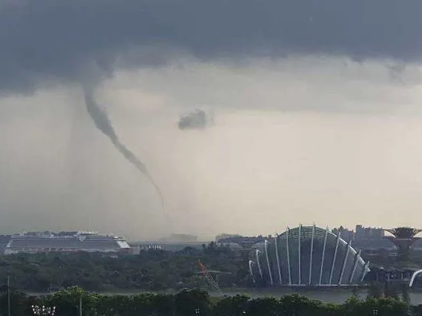 Waterspout seen off southern Singapore amid rainy, stormy weather - TODAY