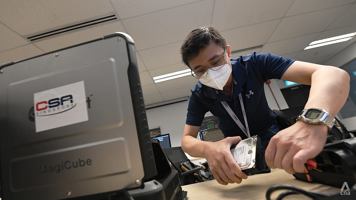 In CSA's forensics lab, officers dissecting cyberattacks use ...