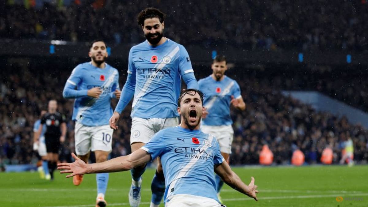 Man City ease to 3-0 win over Liverpool as Guardiola celebrates 1,000th ...