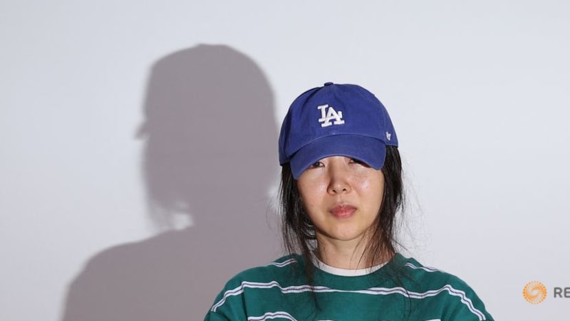 K-pop giant HYBE shares take another hit as dispute with NewJeans label ...