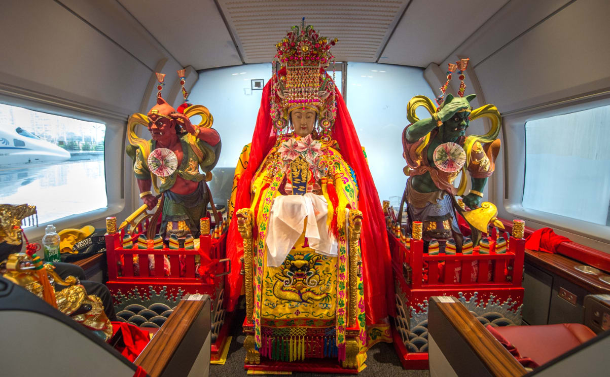 Statue Of Chinese Goddess Seen On Flight, Even Has Her Own Boarding ...