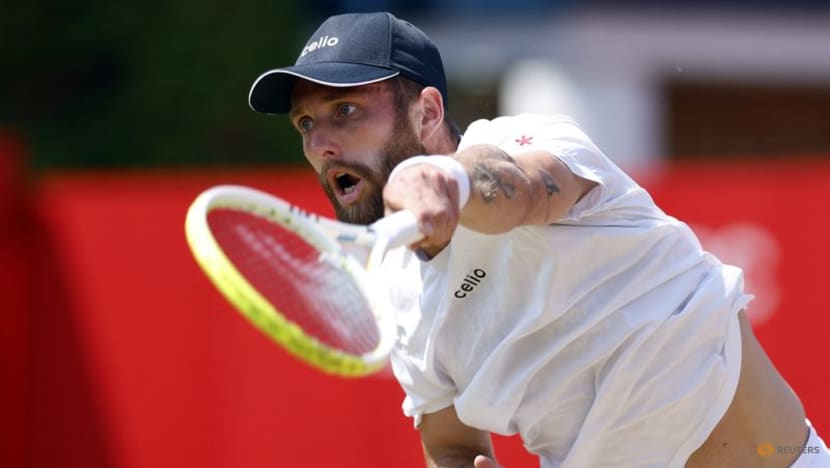 Moutet reaches first grasscourt semi-final after tense win over Tien - CNA