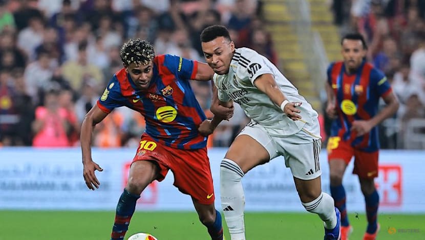 Raphinha strikes twice as Barcelona edge Real Madrid in heated Spanish ...