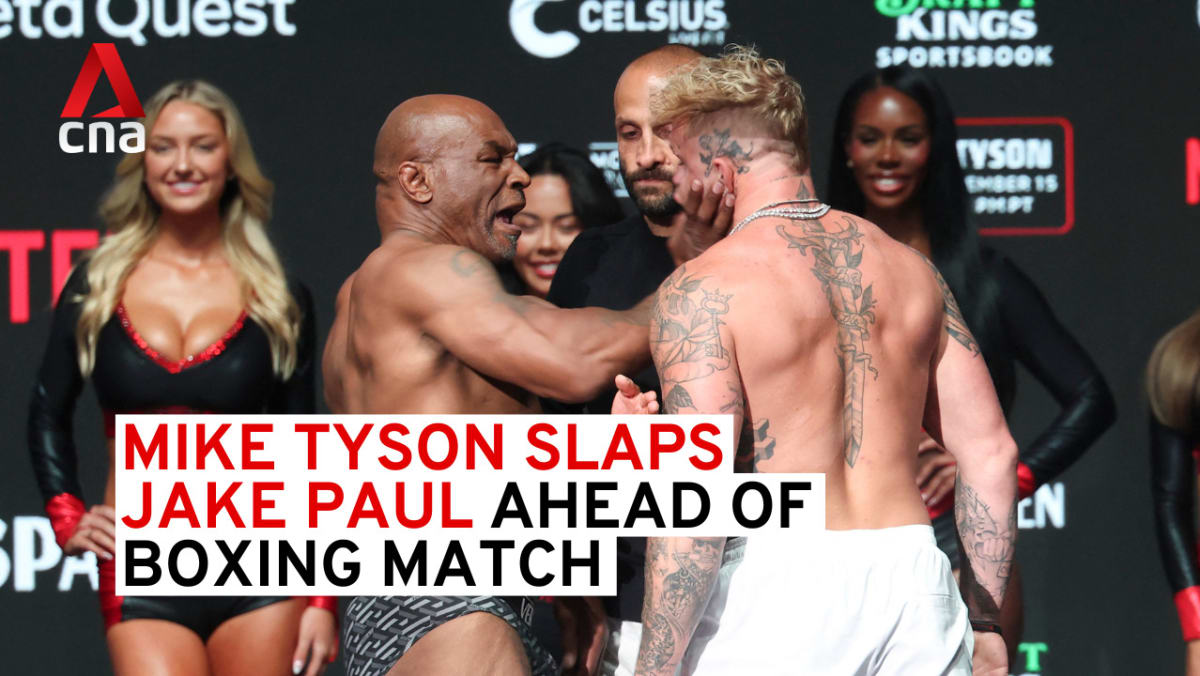Mike Tyson slaps Jake Paul ahead of boxing match | Video - CNA