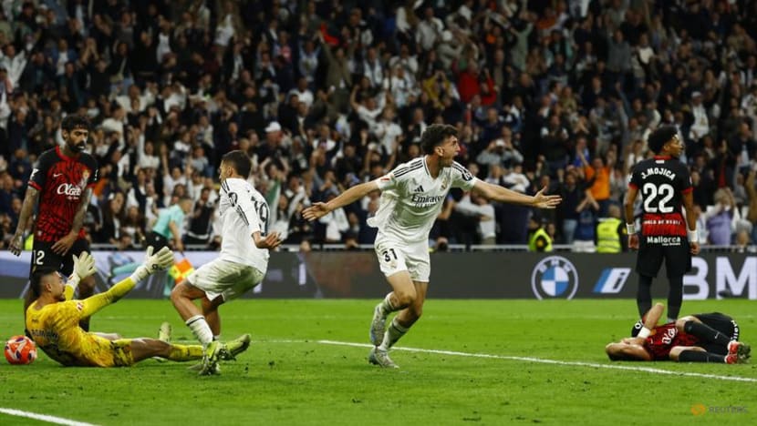 Real Madrid fight back to beat Mallorca and put Barca party on hold - CNA