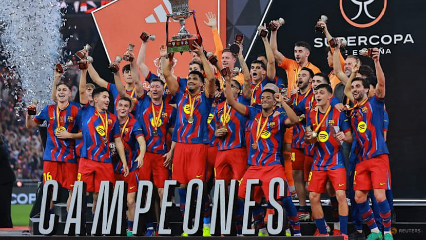 Raphinha strikes twice as Barcelona edge Real Madrid in heated Spanish ...