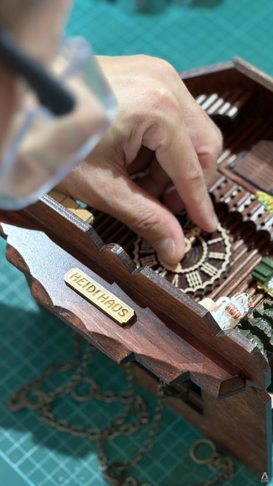 Meet Singapore's only authorised cuckoo clock repair specialist - CNA