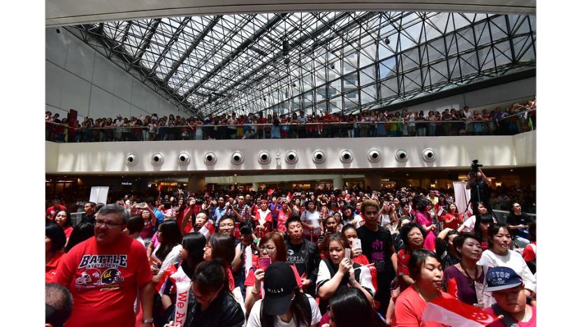 Thousands turn up to cheer Joseph Schooling during victory parade - CNA