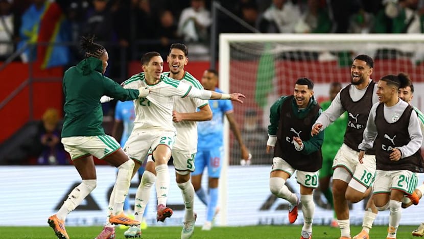 Dramatic late winner puts Algeria into Cup of Nations last eight - CNA
