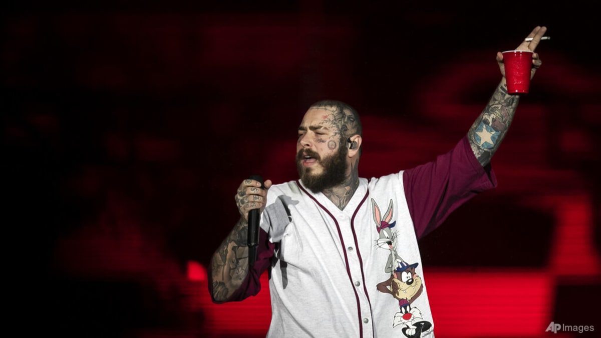 Post Malone falls into hole onstage while performing, cuts concert ...