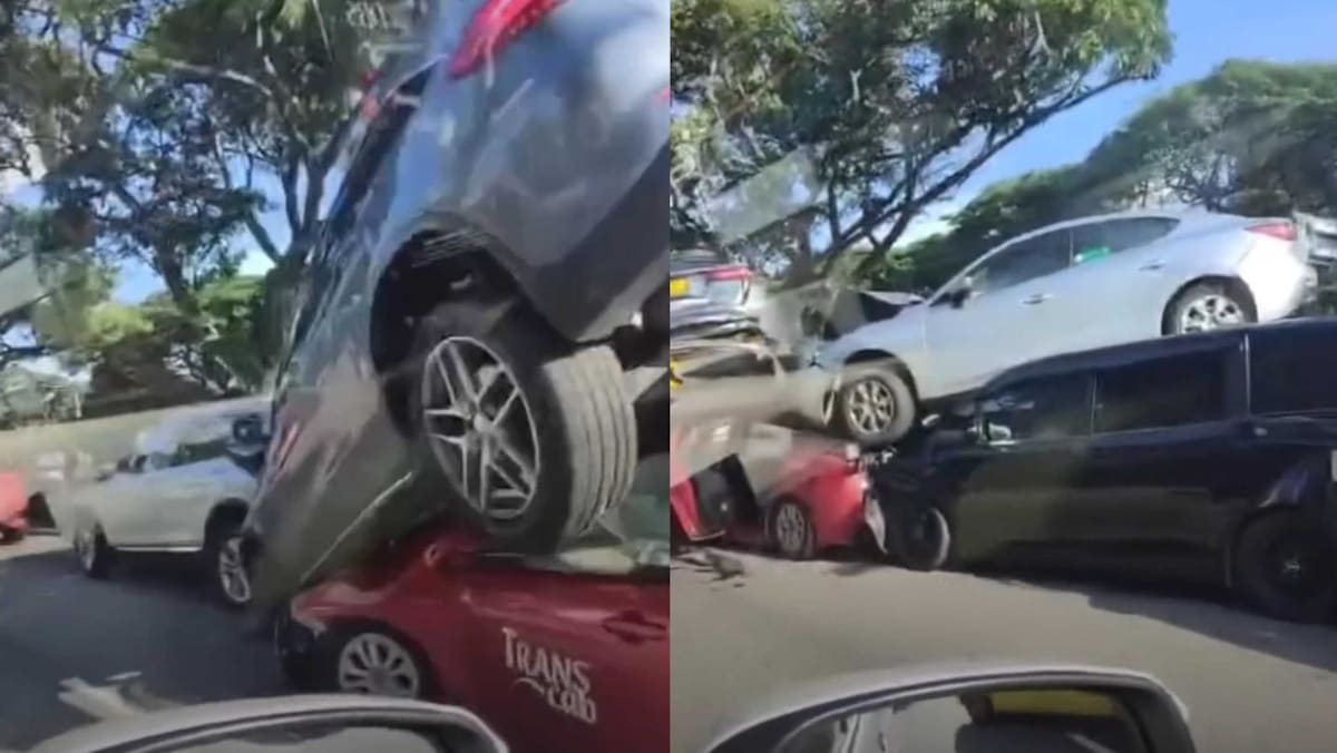 Cars stacked on top of each other after mass pile-up along ECP - CNA