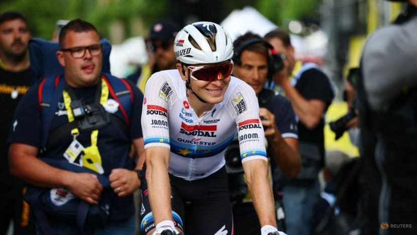 Tim Merlier avoids crashes to take Stage 3 in photo finish - CNA