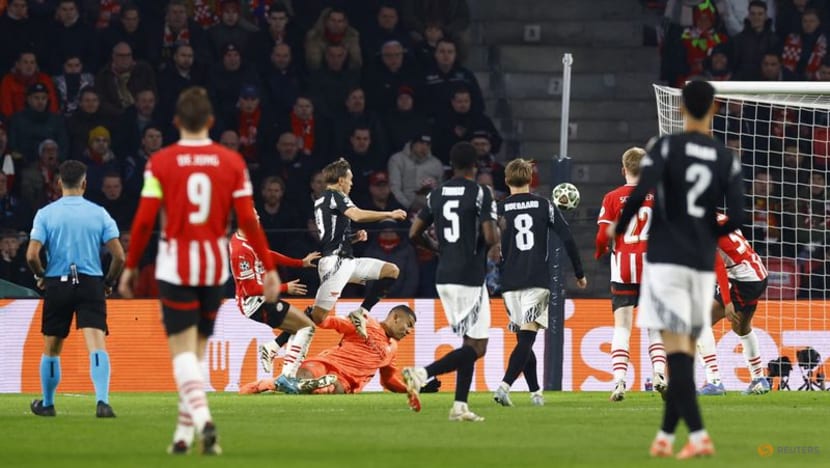Rampant Arsenal thrash PSV 7-1 away in Champions League rout - CNA