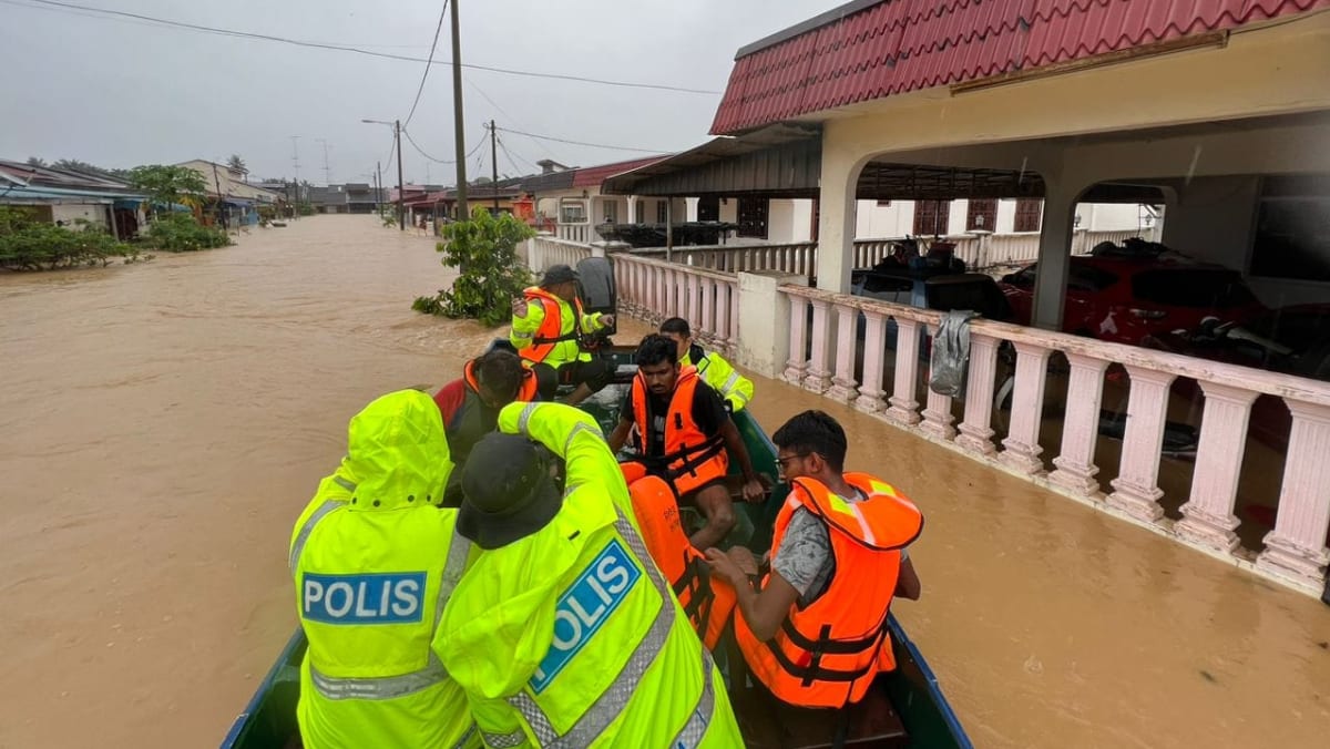 Malaysia floods: Death toll rises to 3, close to 35,000 people evacuated - CNA