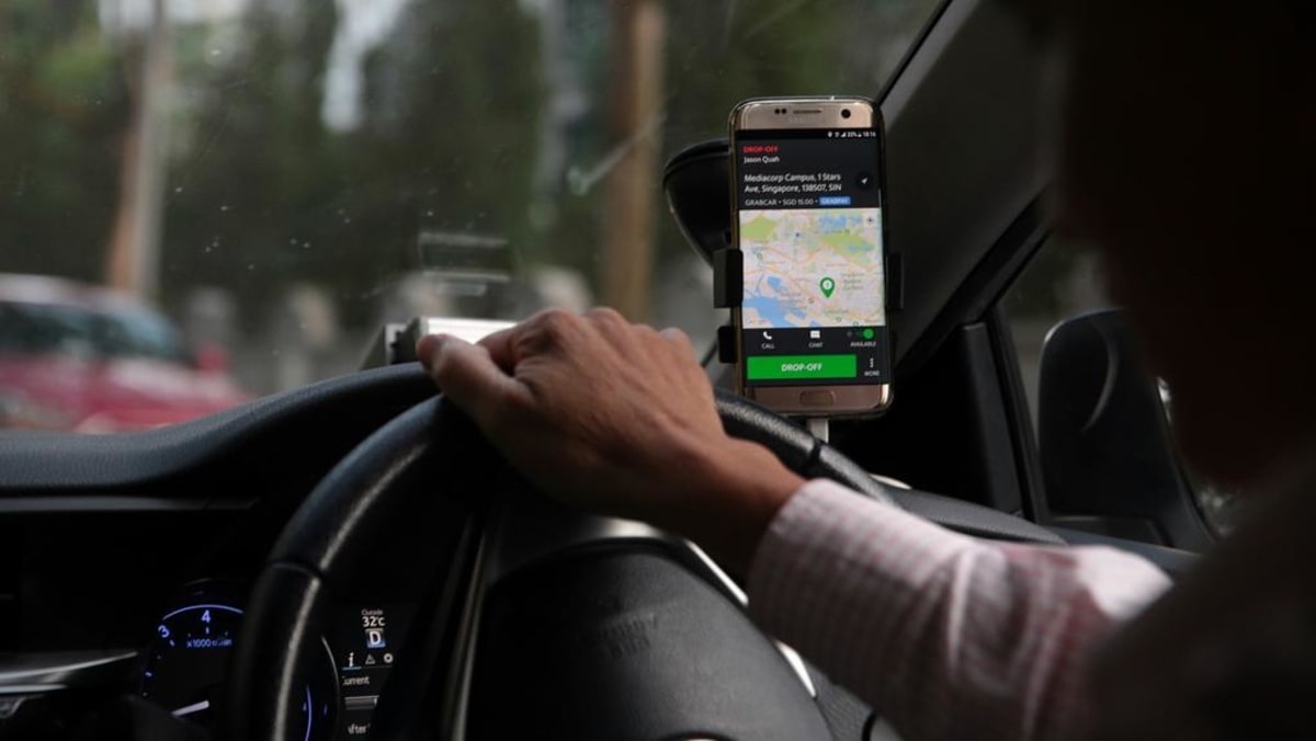 Grab driver pockets phone left behind by passenger, gets S$2,000 fine - CNA