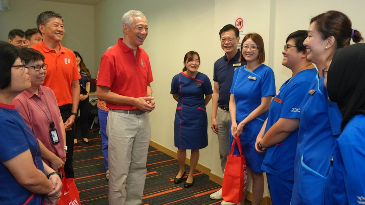 PM Lee strikes optimistic tone about economy; hints at more support for ...