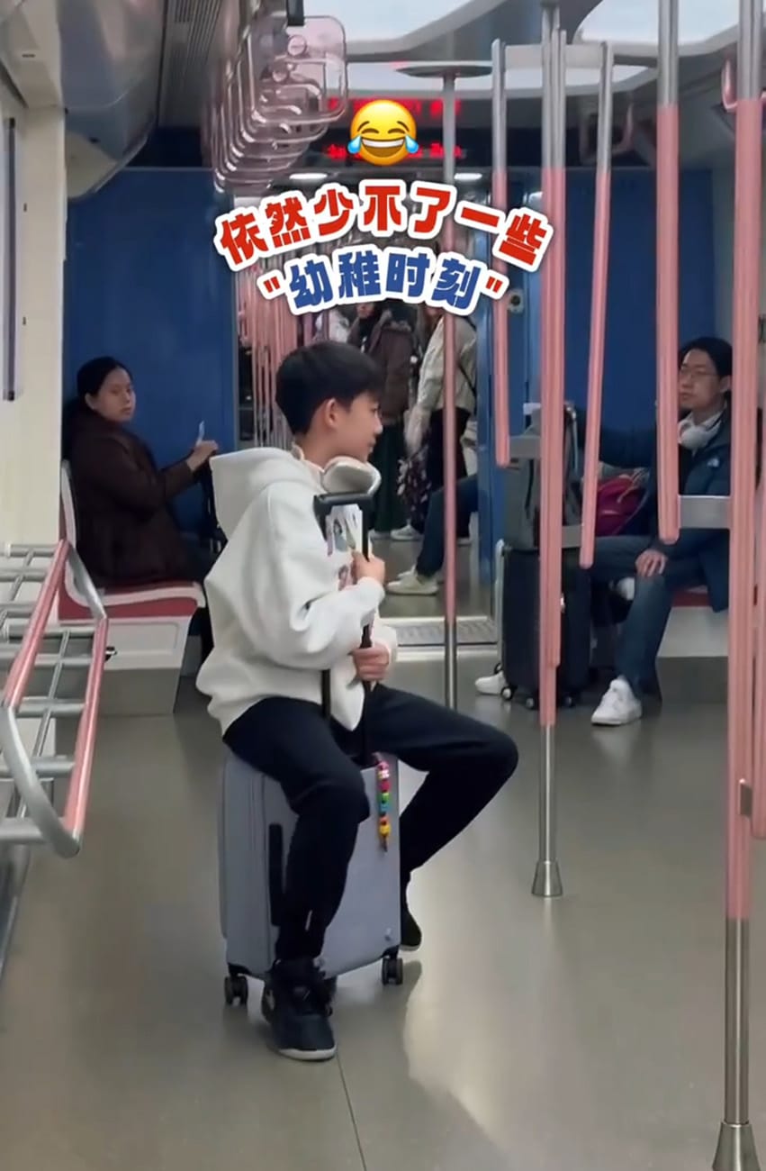 Jordan Chan’s Son, 12, Scoots Around On Suitcase On London Train; Mum ...