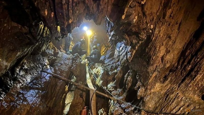 Rescuers seek new route to two missing in Laos cave - CNA