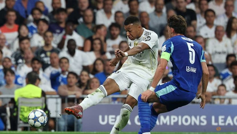 Mbappe on the spot as 10-man Real fight back to beat Marseille - CNA