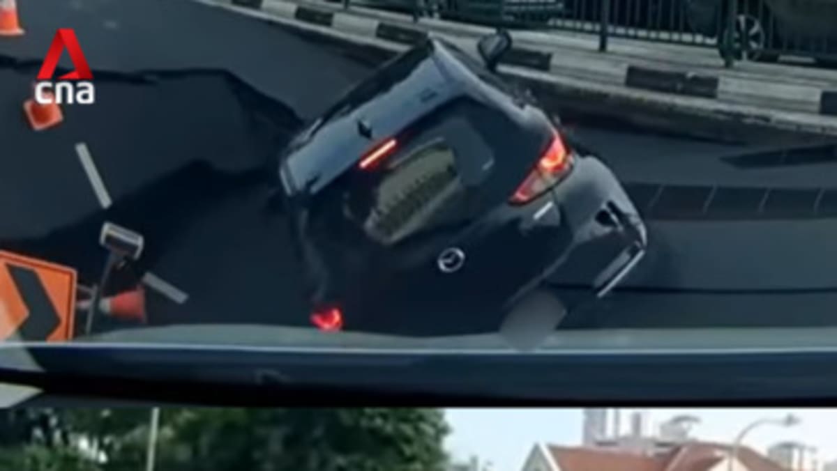 Dashcam footage shows moment car fell into sinkhole - CNA