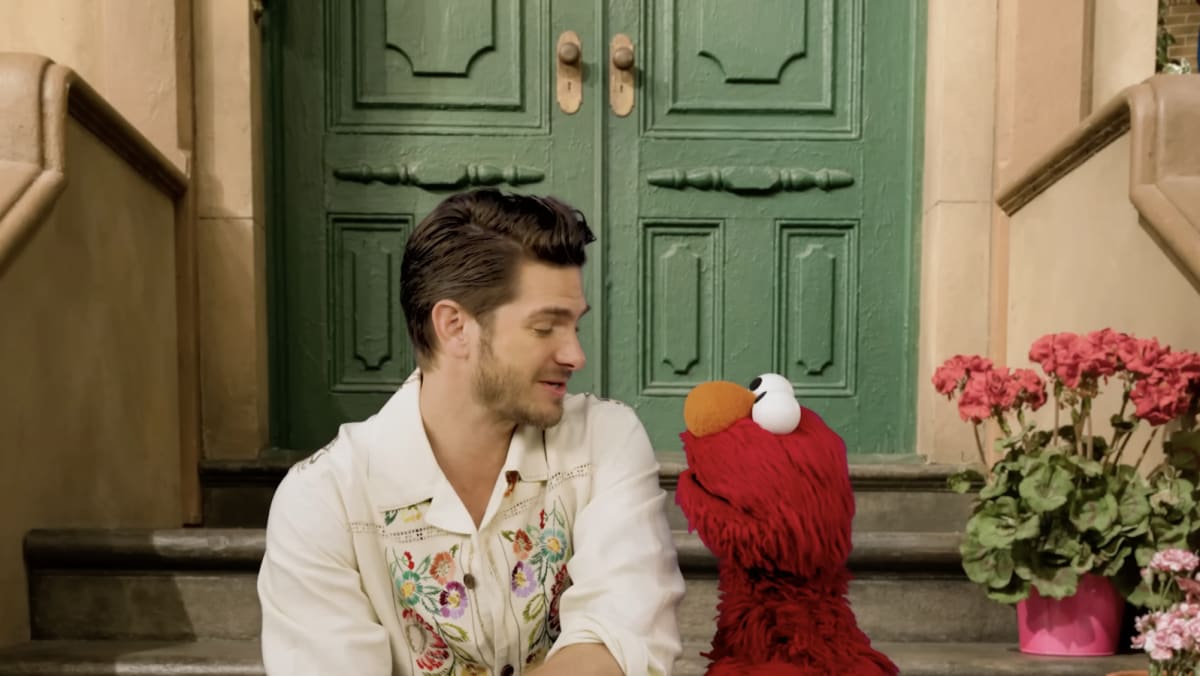 Viral video of actor Andrew Garfield and Elmo talking about grief gets over 14 million views ...