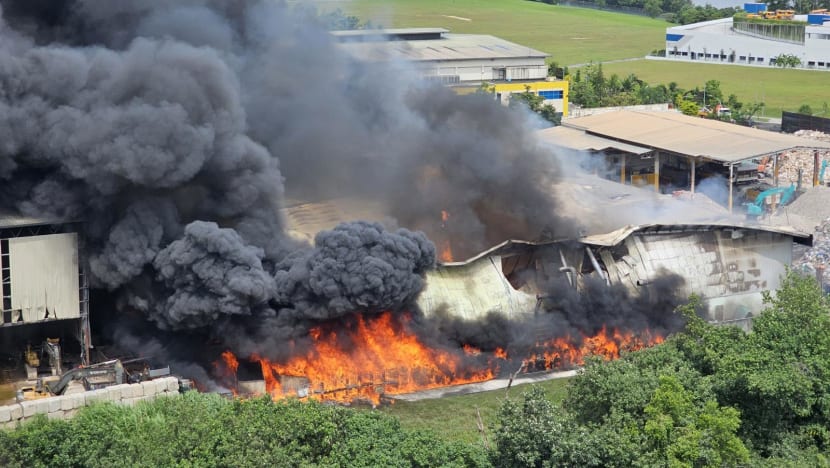Firefighters battle hours-long Kranji warehouse blaze; one person taken ...
