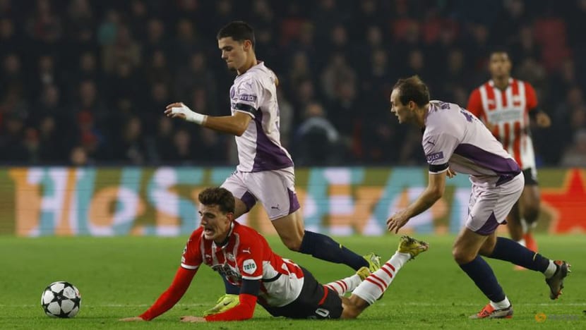 PSV Eindhoven ease to 4-0 victory over 10-man Girona - CNA