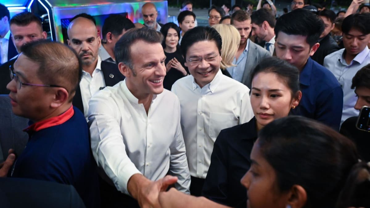 French President Macron and Singapore PM Lawrence Wong visit Lau Pa Sat ...