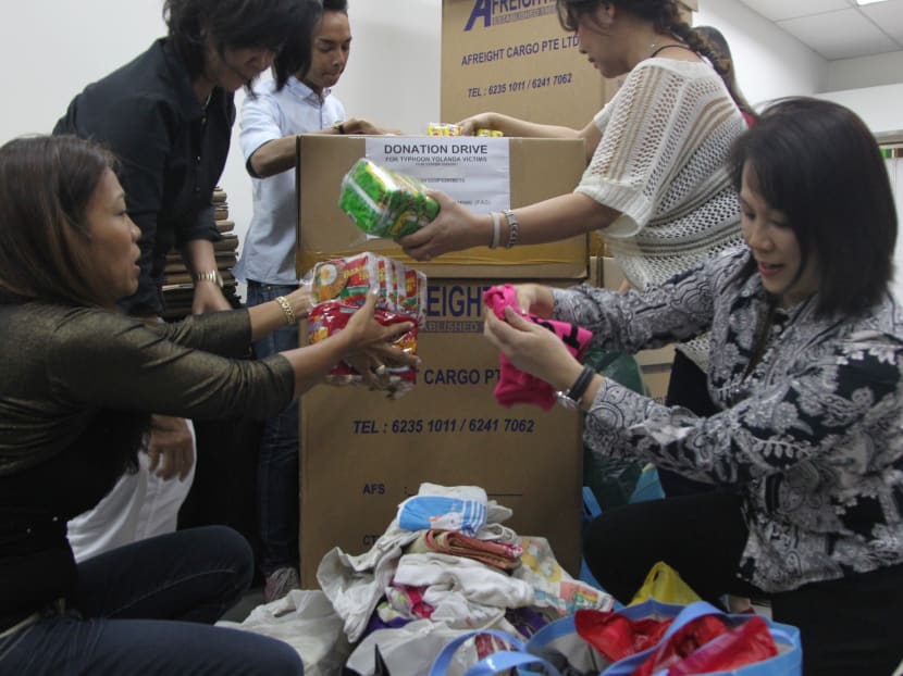 Filipinos in Singapore rally to help typhoon survivors - TODAY