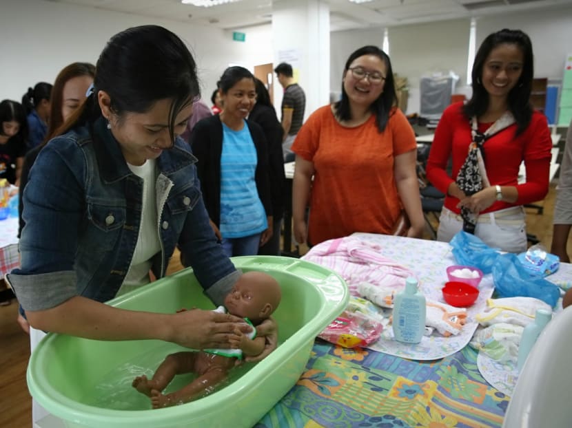 Domestic workers get help to care for infants better - TODAY