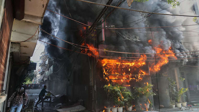 Fire sweeps through New Delhi building, killing at least 21 people - CNA