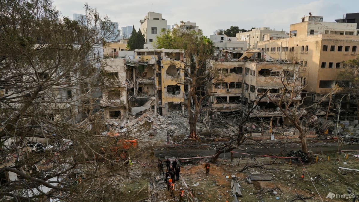 Iranian missiles hit Tel Aviv and Haifa, Israel warns of tough response ...