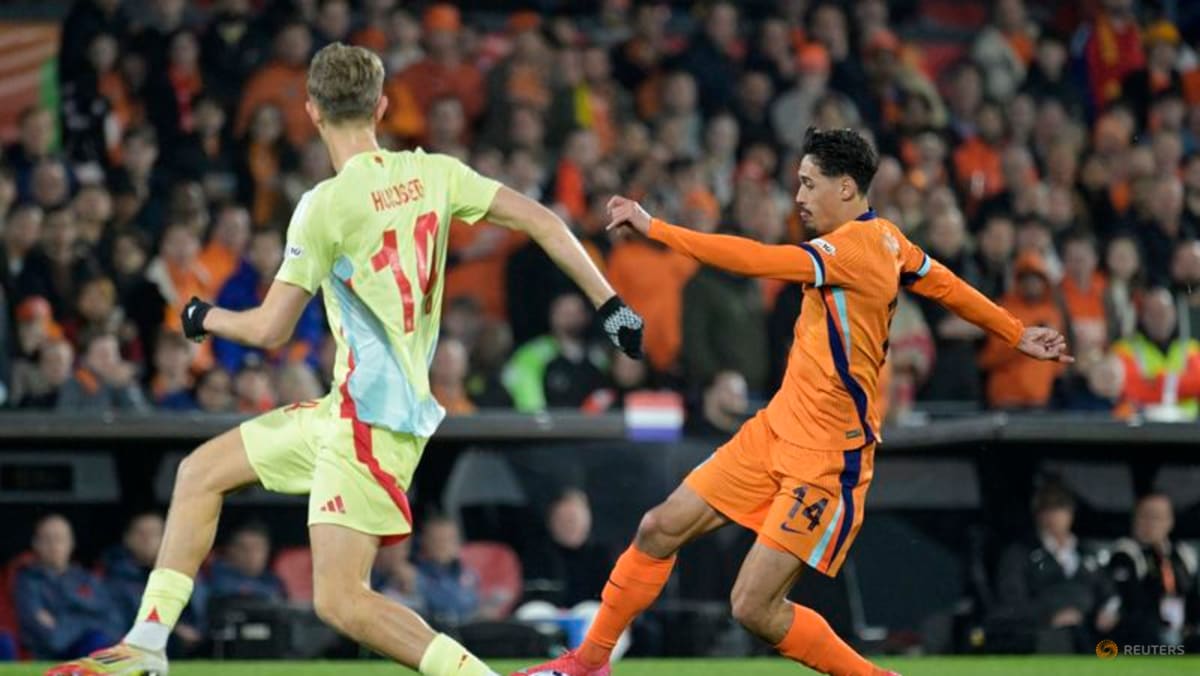 Spain defender Huijsen gets hostile reception in Rotterdam - CNA
