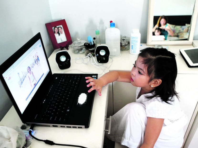 children interacting with technology