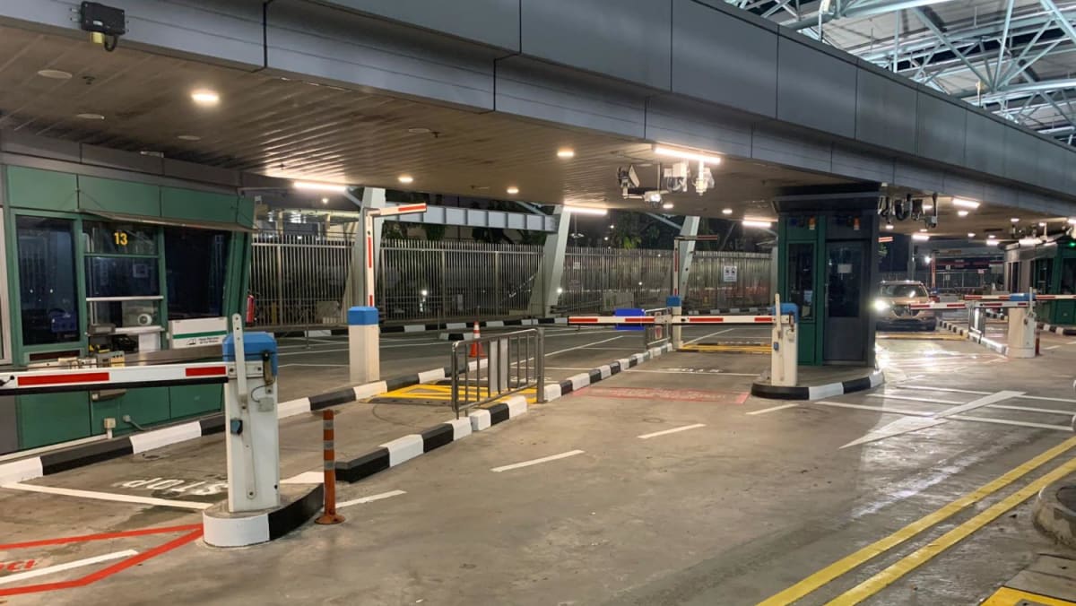 After midnight queues, a quiet first morning at Woodlands Checkpoint as ...