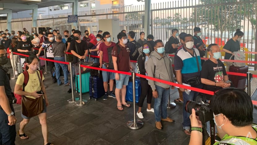 After midnight queues, a quiet first morning at Woodlands Checkpoint as ...