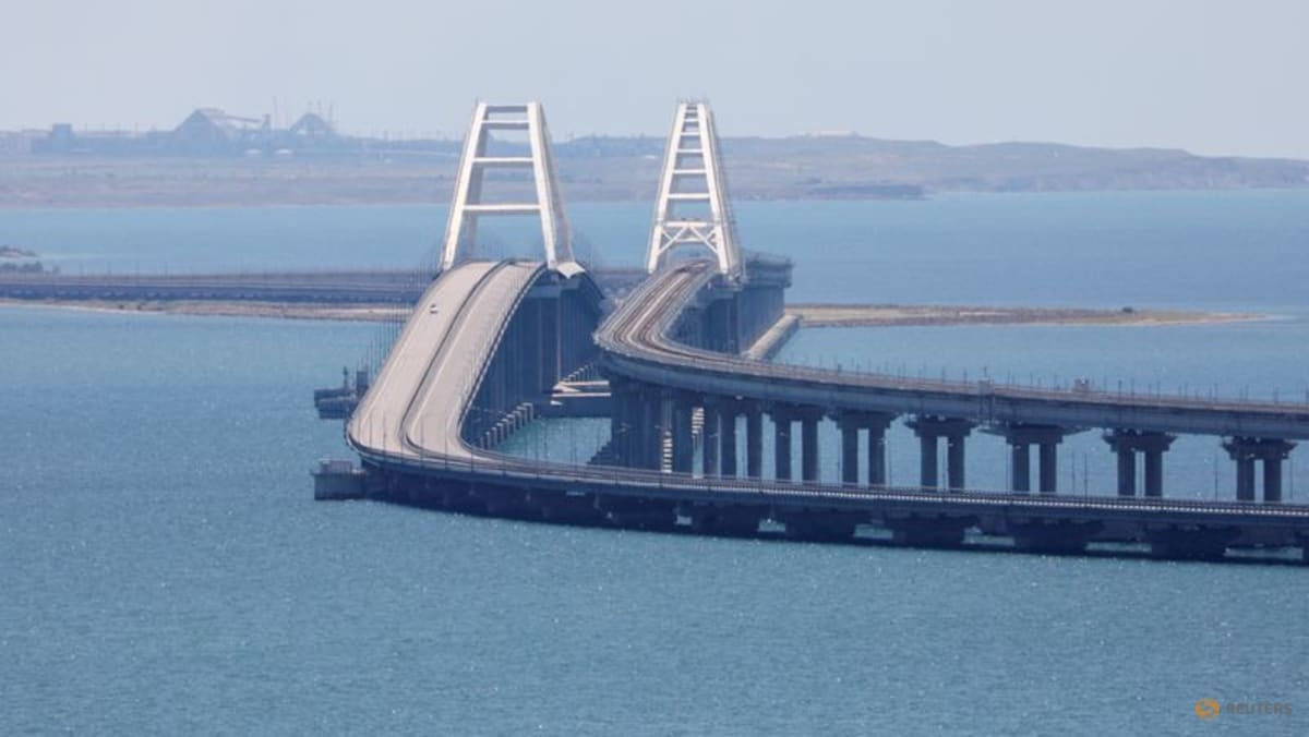 Ukraine says it hit Russia's bridge to Crimea with underwater explosives - CNA