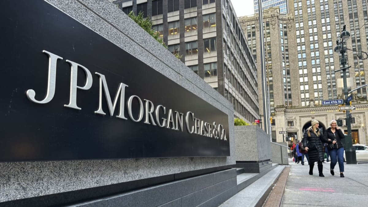 JPMorgan earns biggest-ever annual profit as investment bankers ride ...