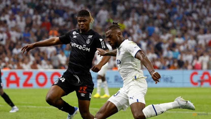 Wolves sign Reims defender Agbadou - CNA