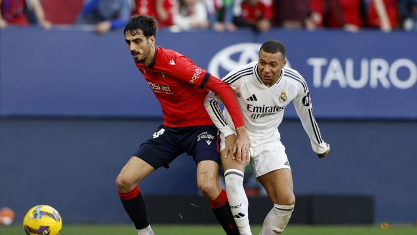 Ten-man Real Madrid held by Osasuna after Bellingham sees red - CNA