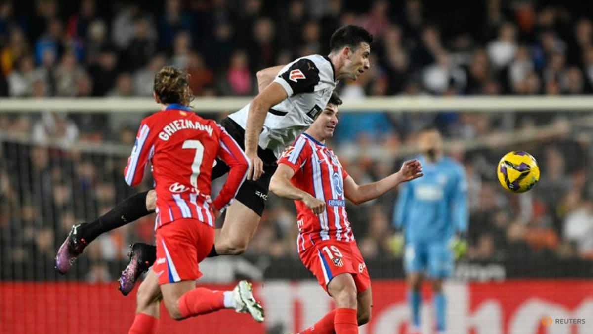 Atletico claim provisional top spot with 3-0 win at Valencia - CNA