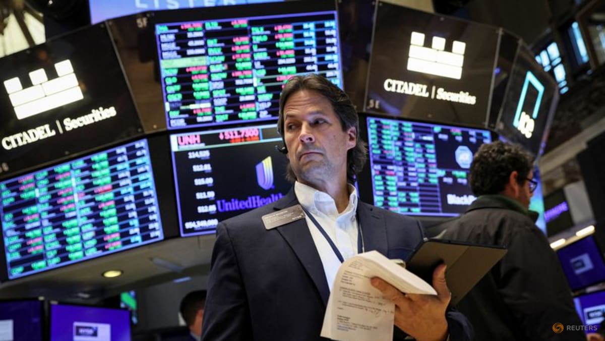 Stocks tumble, dollar rallies as US inflation heats up - CNA