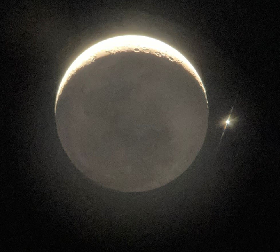 In pictures: Venus at the tip of a glowing crescent moon over Singapore ...