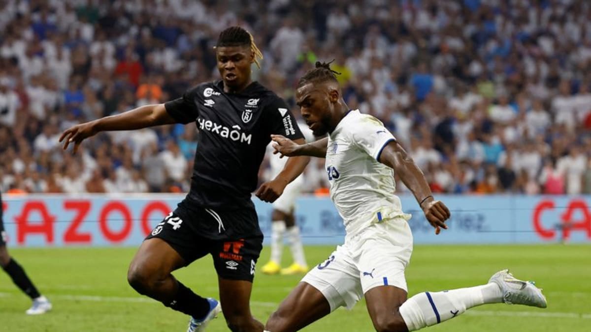 Wolves sign Reims defender Agbadou - CNA