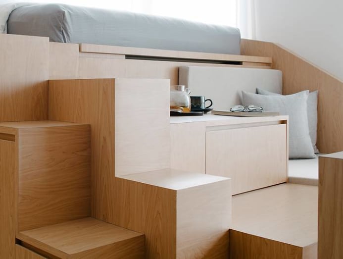 A 460 sq ft studio apartment with a literal out-of-the-box space-saving ...