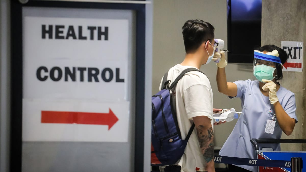 Thai immigration officers at Bangkok airport diagnosed with Covid-19 ...